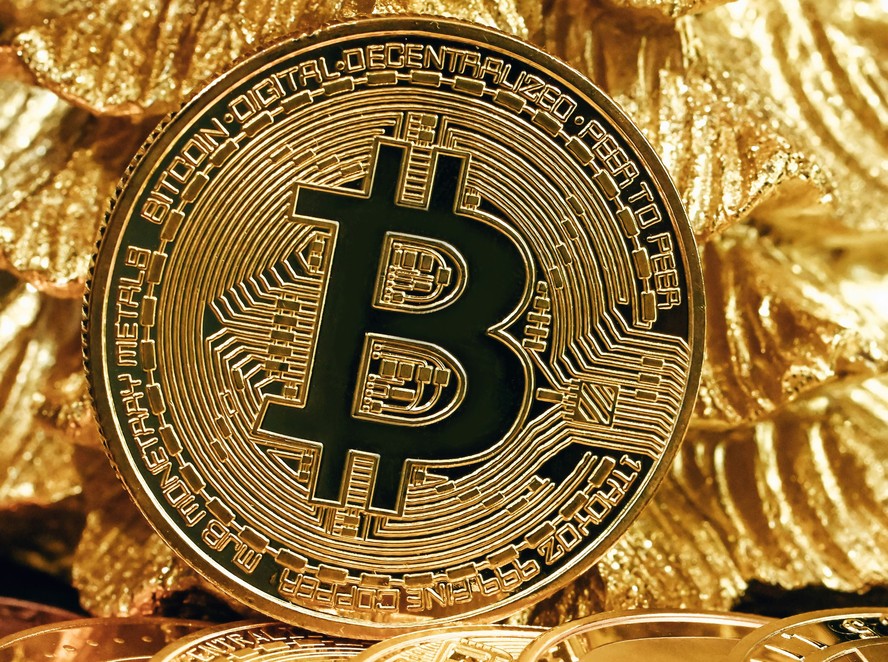 Bitcoin pode chegar a US$ 100 mil com ciclo de cortes de juros nos EUA ...