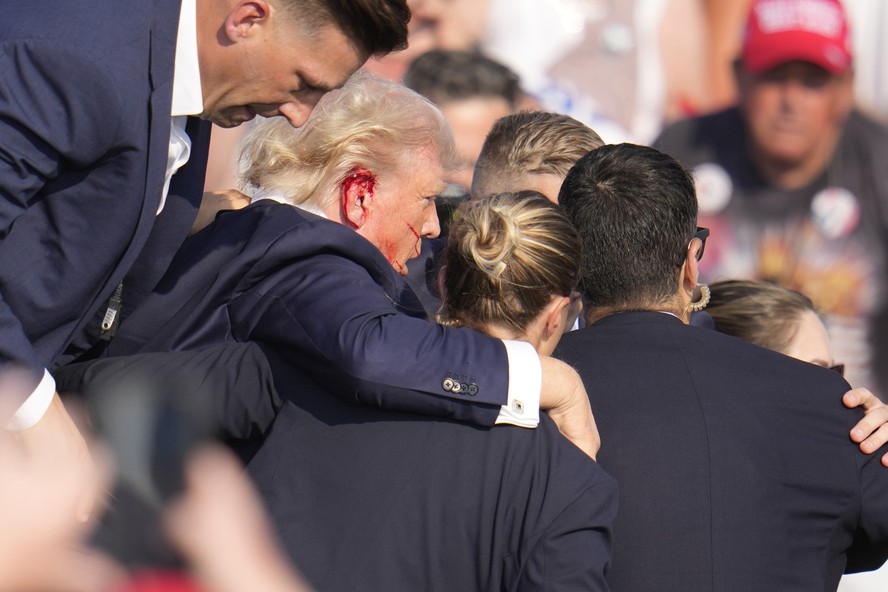 Trump diz que bala teria perfurado parte superior de sua orelha | Mundo ...