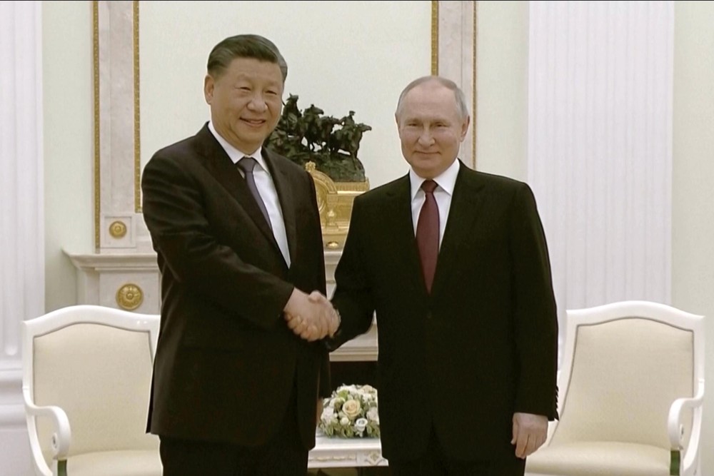 Xi ganha apoio de Putin sobre Taiwan e faz papel de pacificador na ...